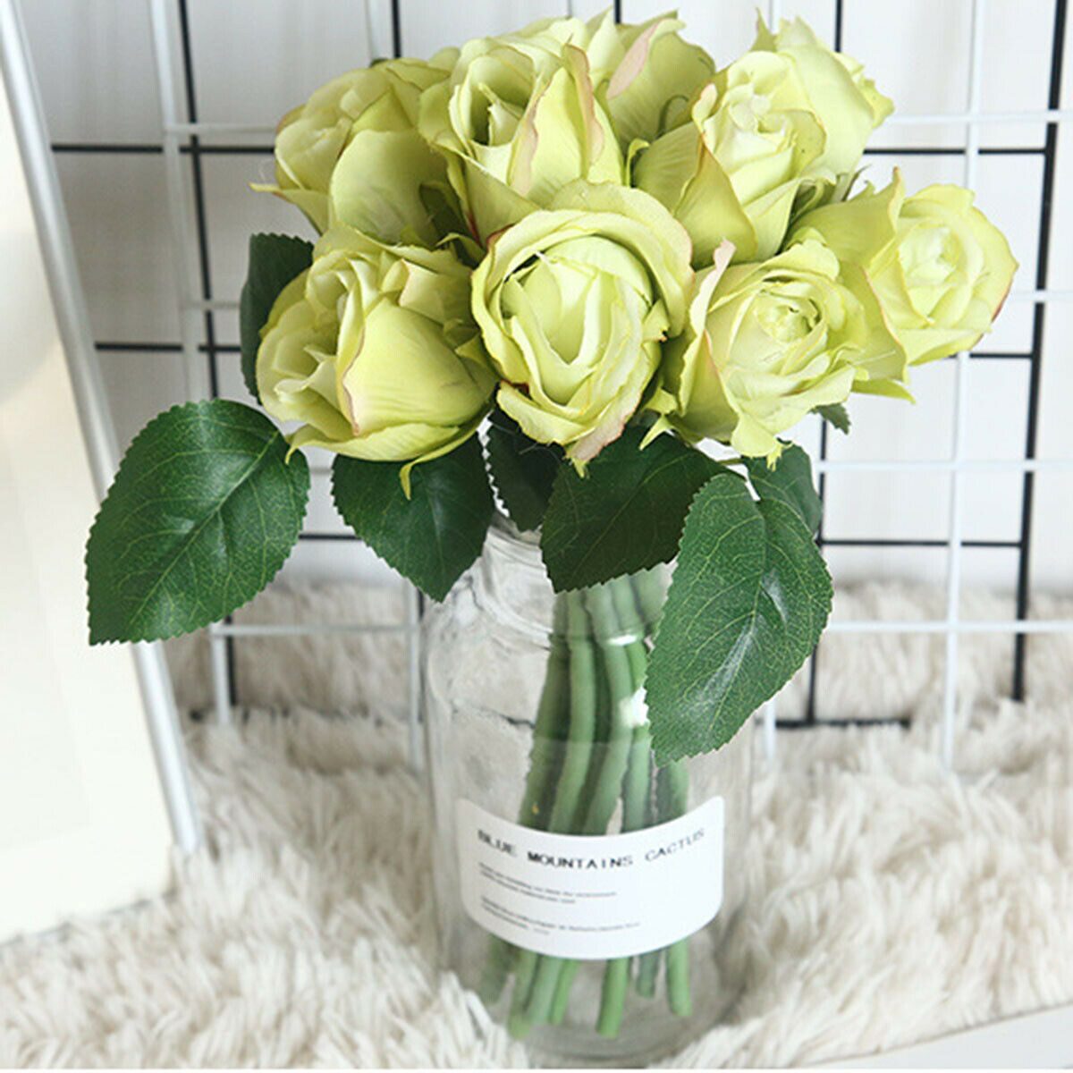 11heads-fake-roses-wedding-arrangement